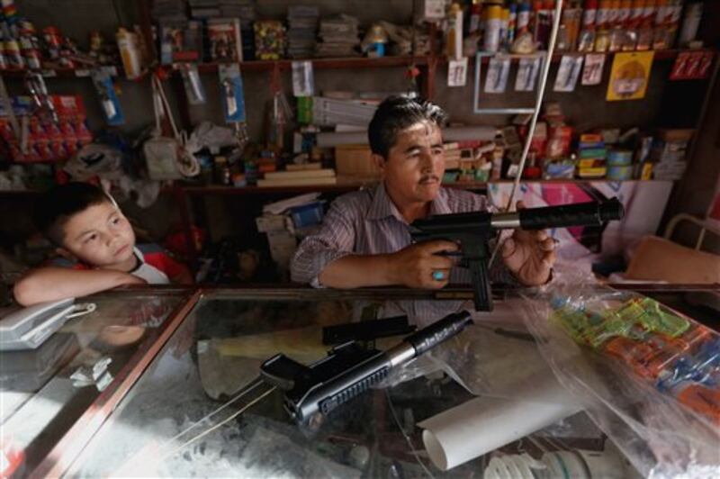 Awash in arms, Afghanistan bans toy guns